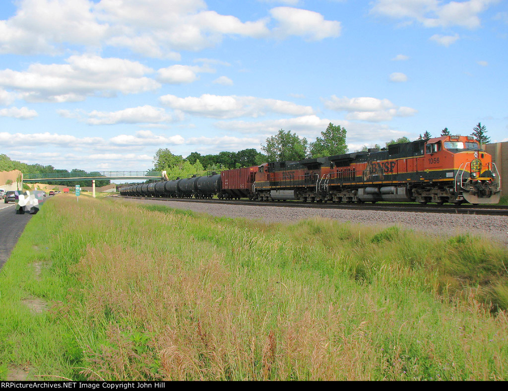110712030 Westbound BNSF unit tank train waits on mainline for a meet
